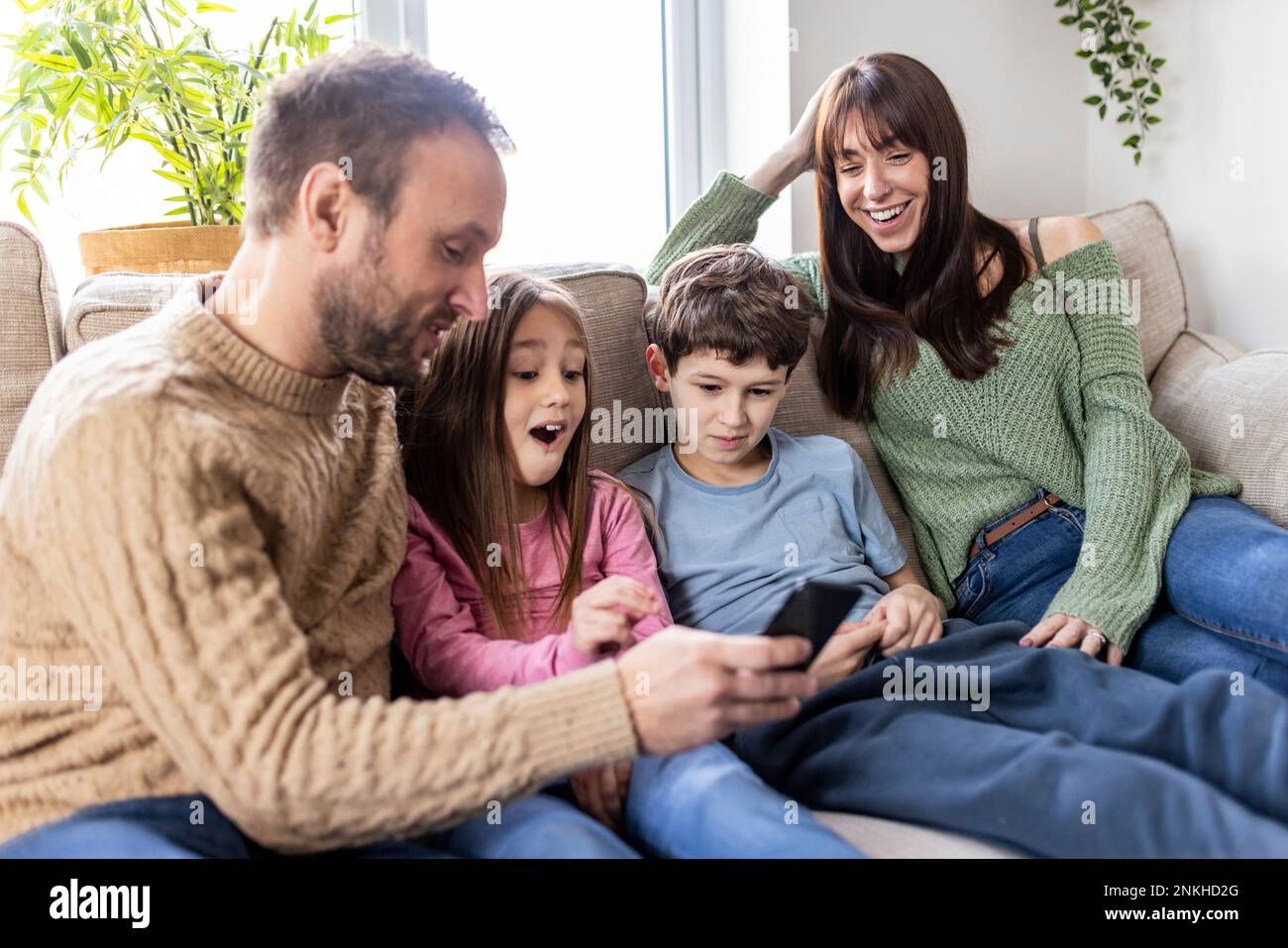 Family smart home hi-res stock photography and images - Alamy