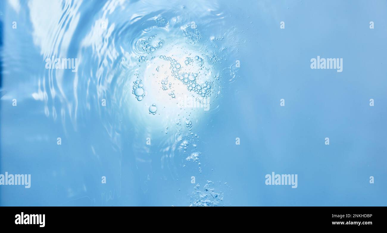 Surface of clean blue water Stock Photo - Alamy