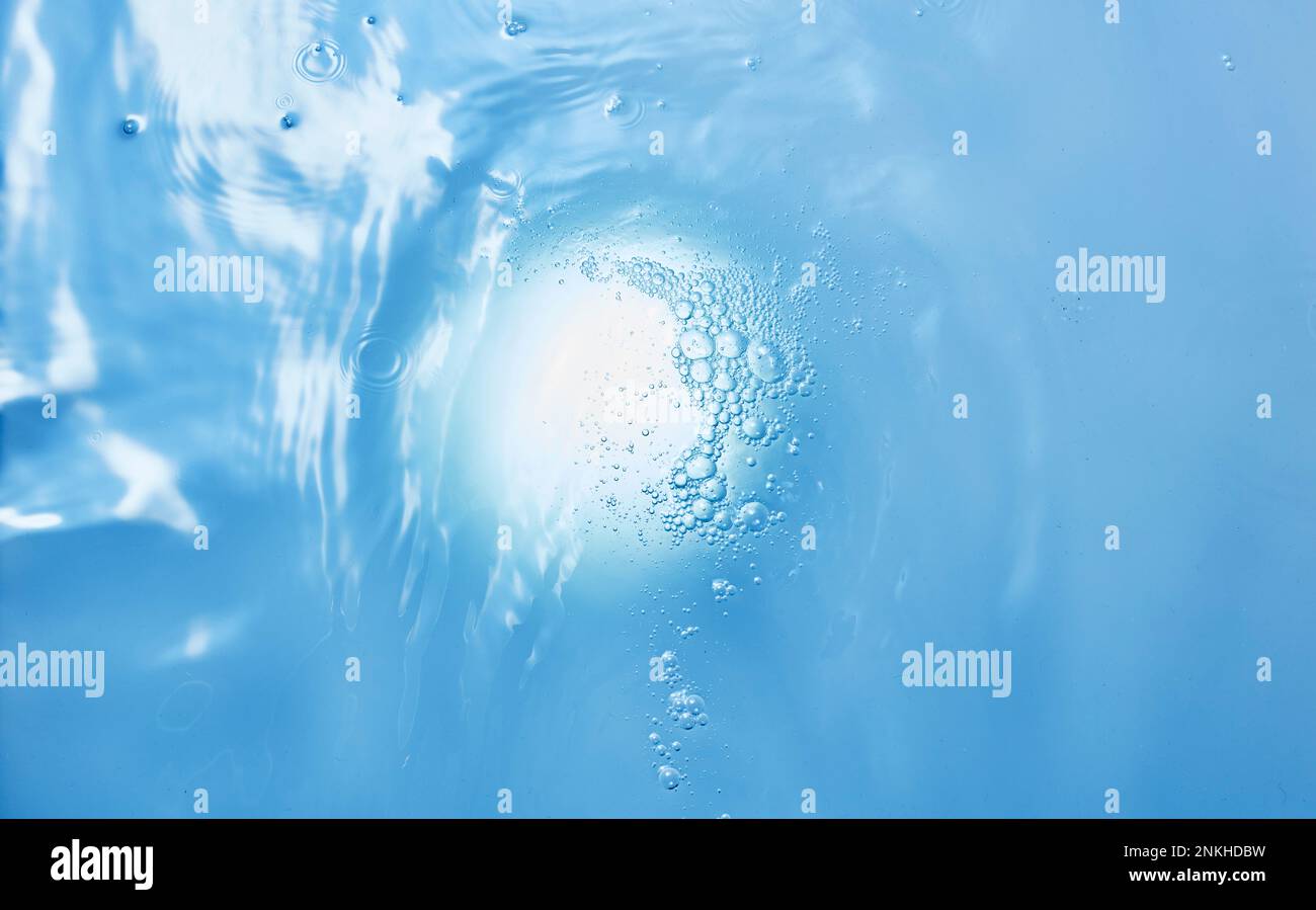 Surface of clean blue water Stock Photo - Alamy