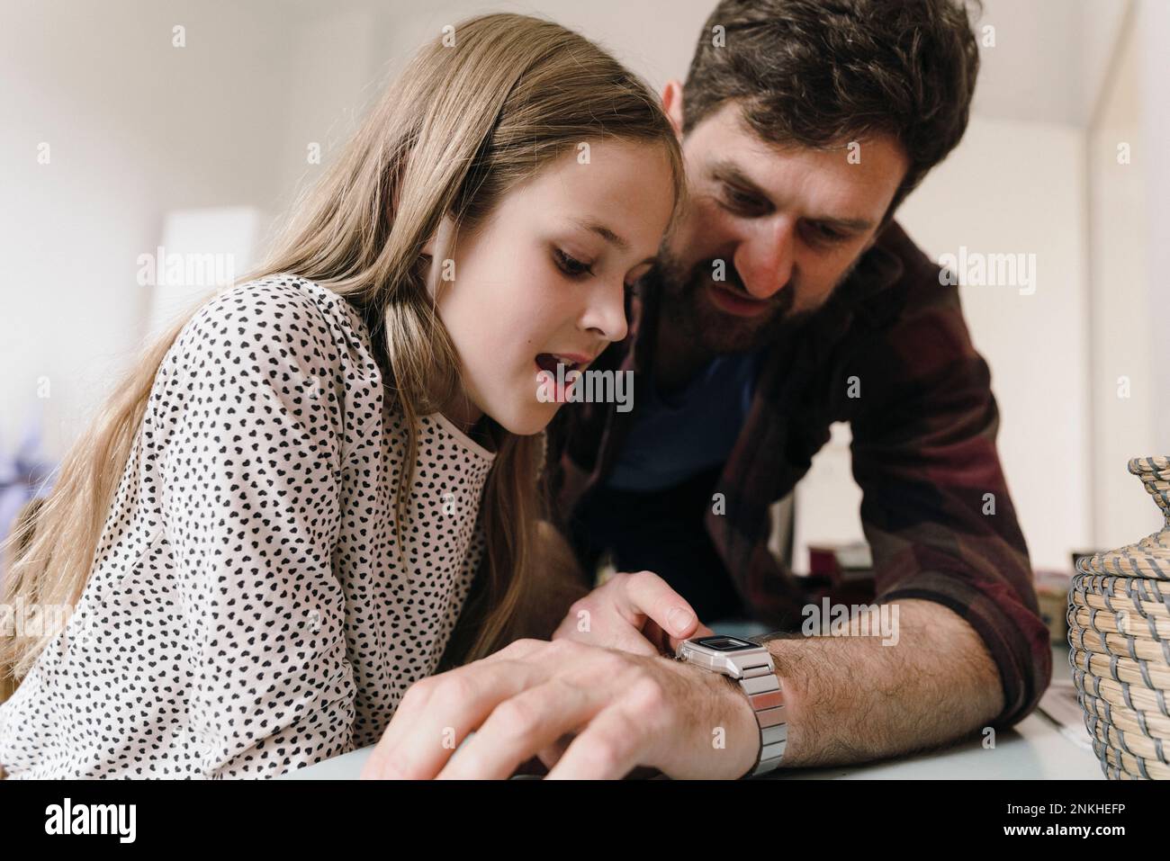 Father using smart watch hi-res stock photography and images - Alamy