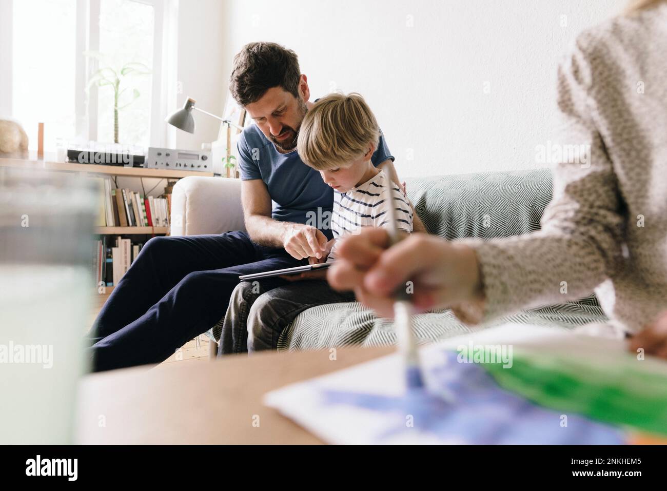 Man explaining to his parents hi-res stock photography and images - Alamy
