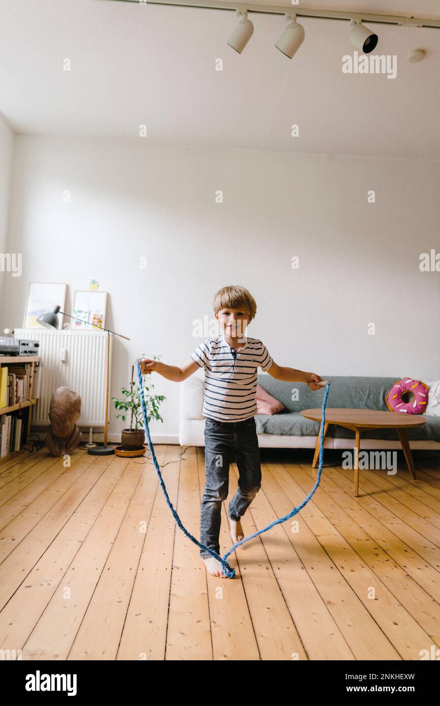 Children jumping rope hi-res stock photography and images - Alamy