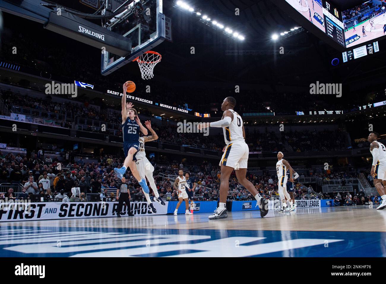 INDIANAPOLIS, IN - MARCH 19: Saint Peter's Peacocks guard Doug Edert ...