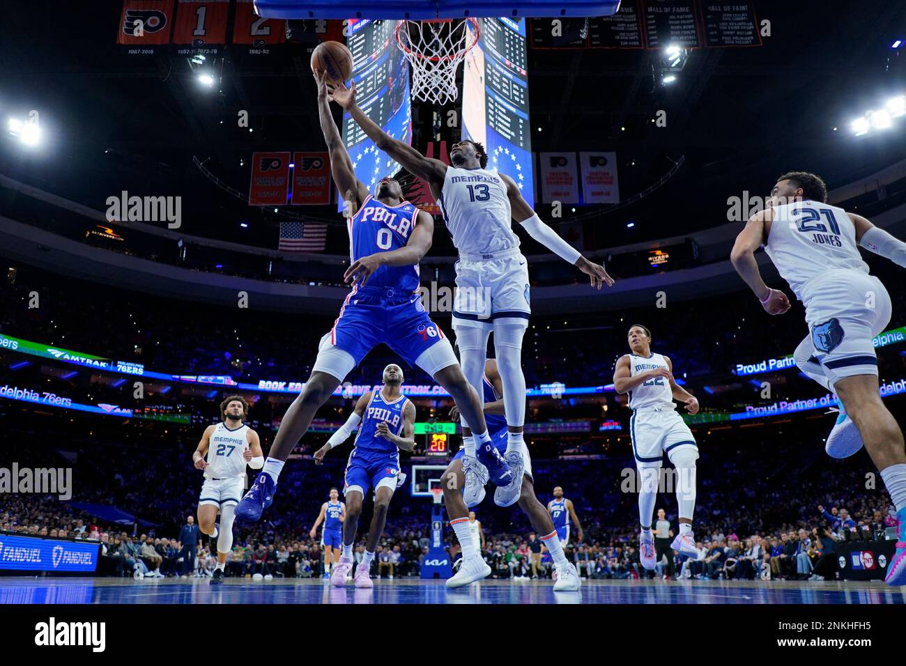 Philadelphia 76ers' Tyrese Maxey (0) goes up for a shot against Memphis ...