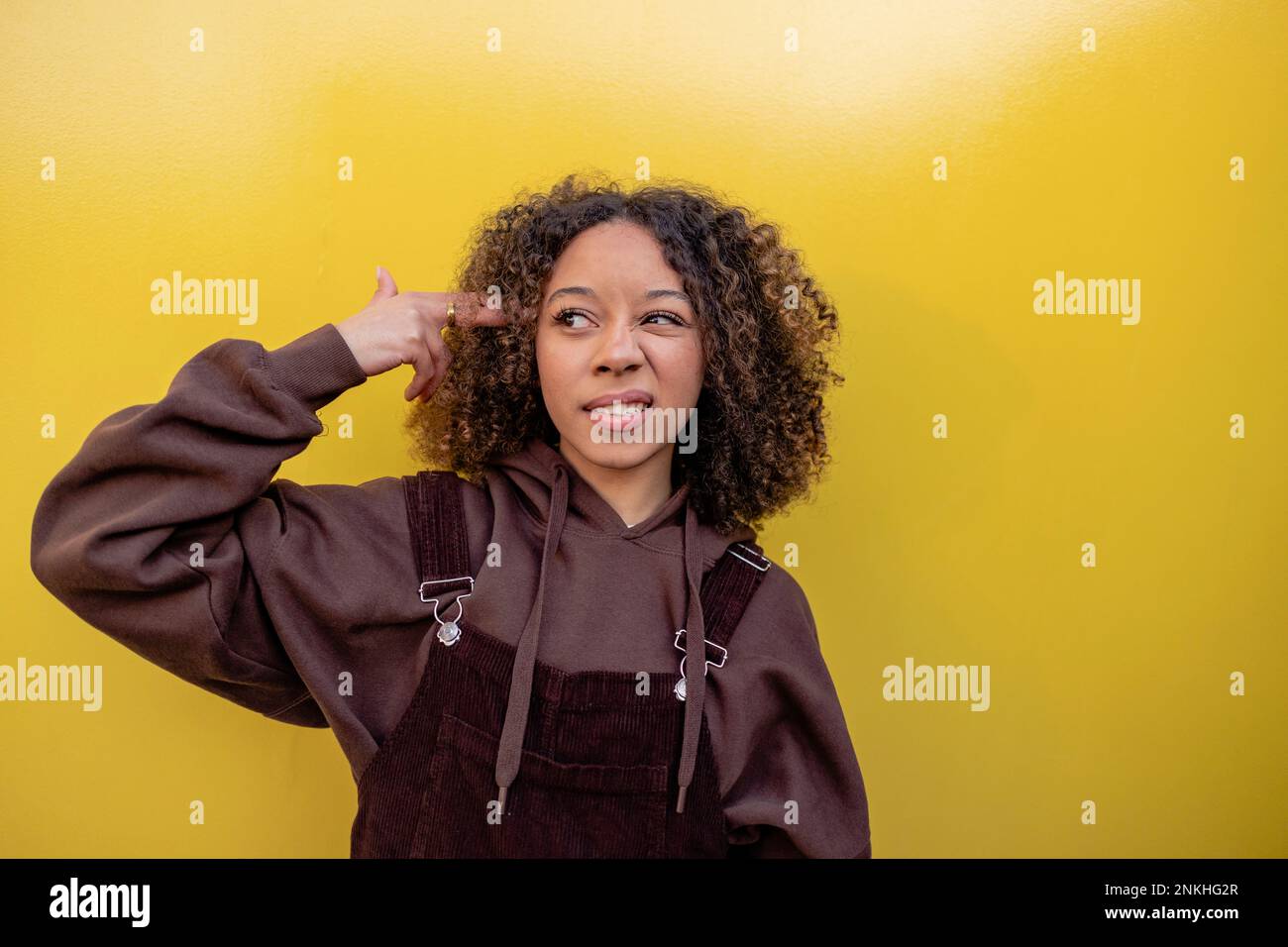 Woman holding funny sign hi-res stock photography and images - Alamy