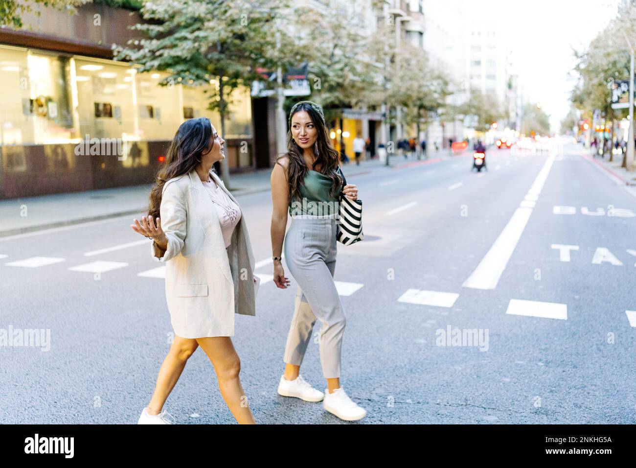 Two mature women friends walking hi-res stock photography and images ...
