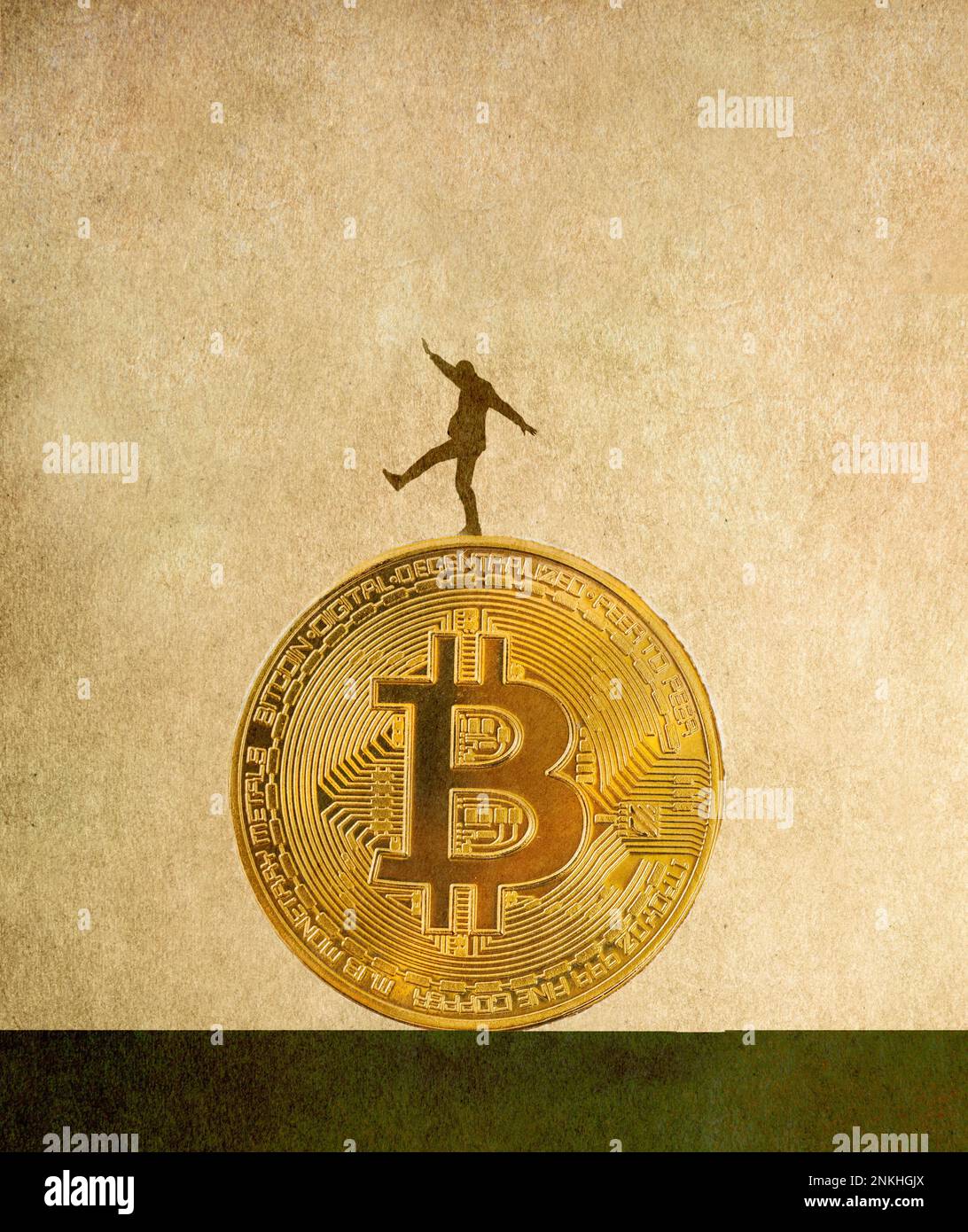 Illustration of man balancing on top of large Bitcoin Stock Photo - Alamy