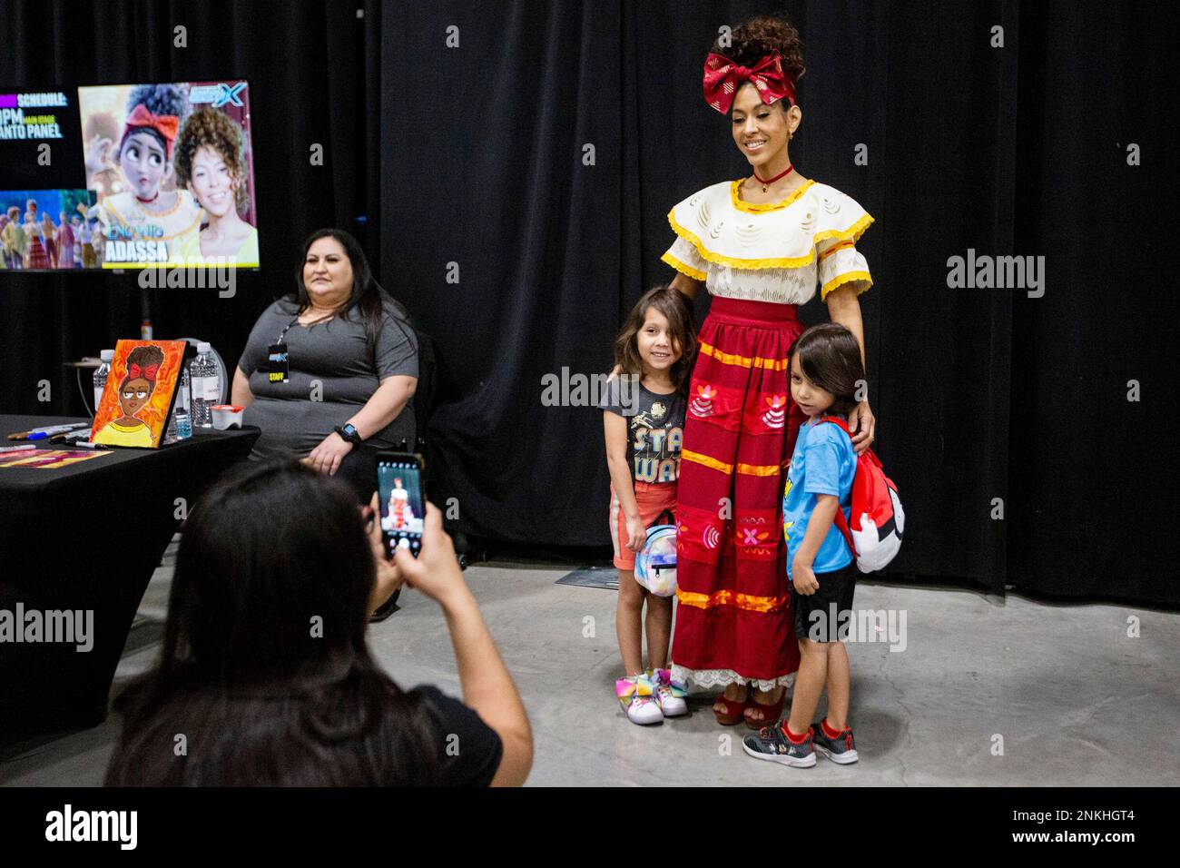 Adassa, center, singer and character voice for Dolores in Disney's ...