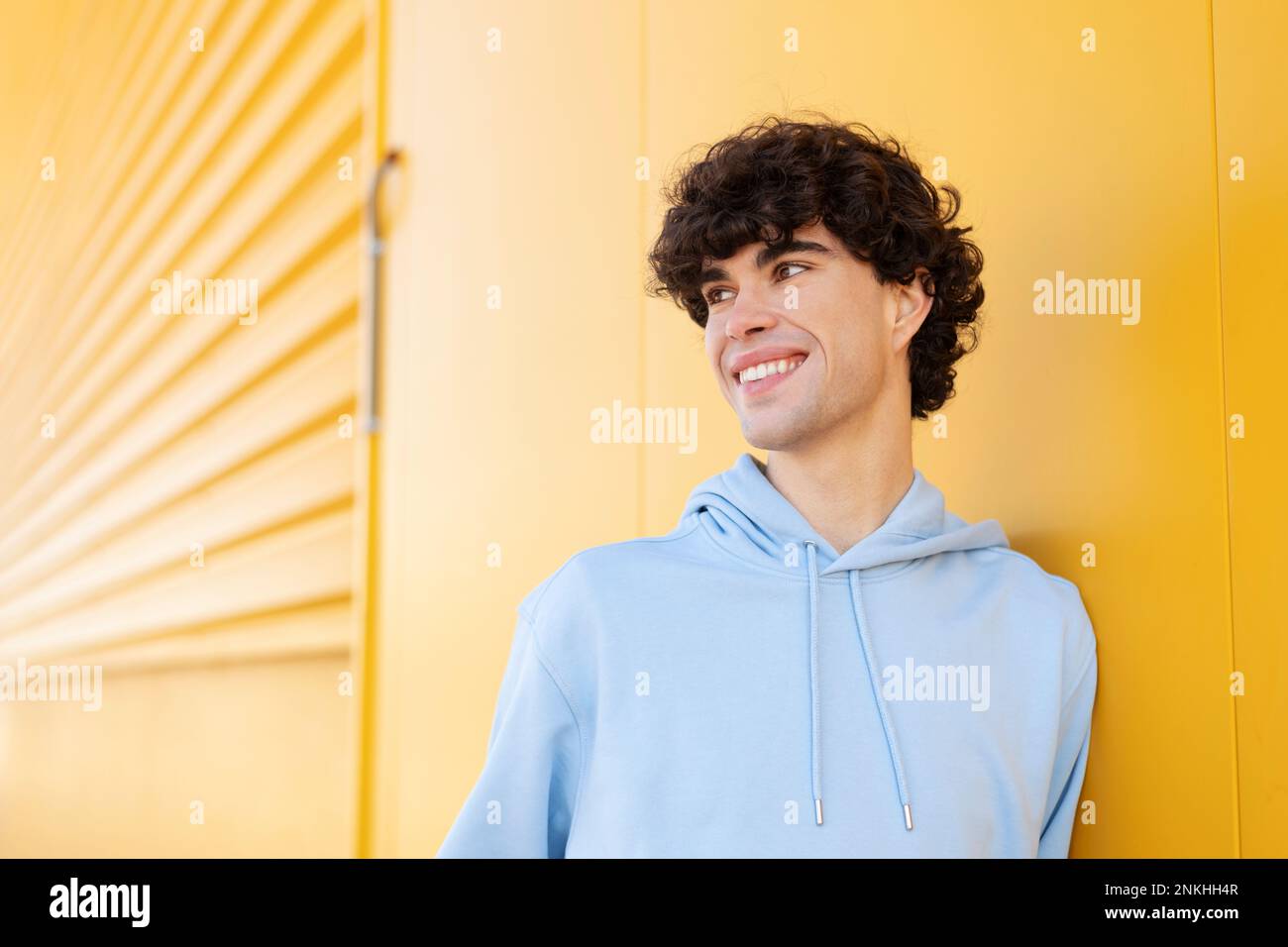 Man standing wall hi-res stock photography and images - Alamy