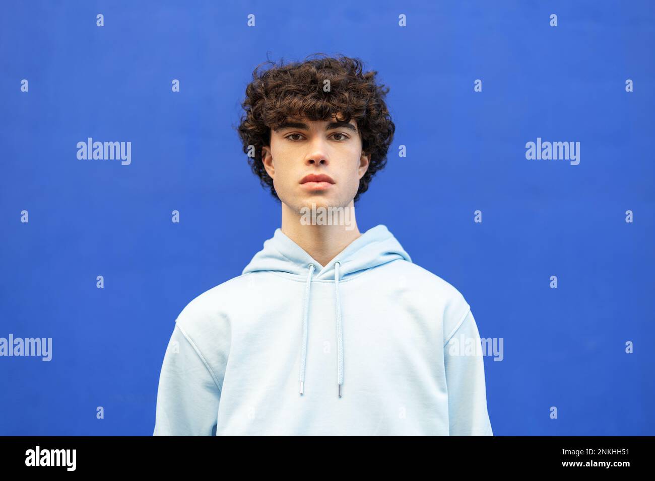 Blue hooded shirt hi-res stock photography and images - Alamy