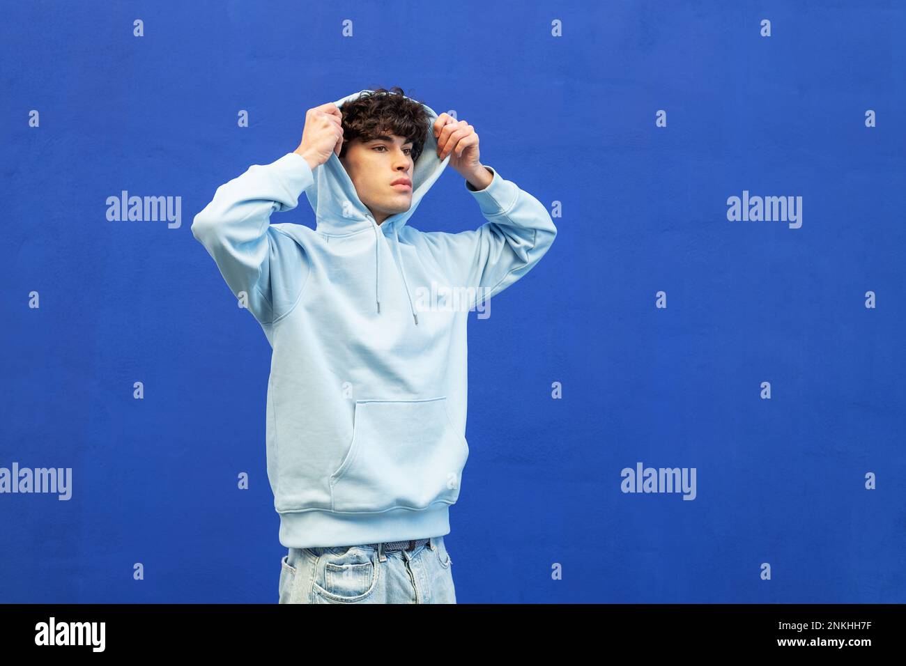 Blue hooded shirt hi-res stock photography and images - Alamy