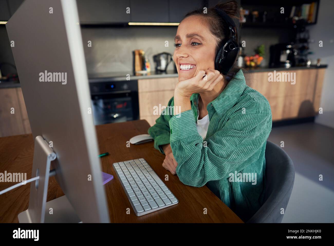 Happy freelancer wearing wireless hi-res stock photography and images ...