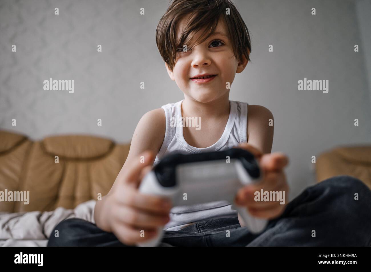 Boy with controller hi-res stock photography and images - Alamy