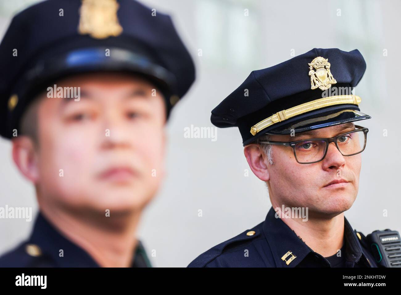 San Francisco police captain Chris Canning (right) listens to another ...
