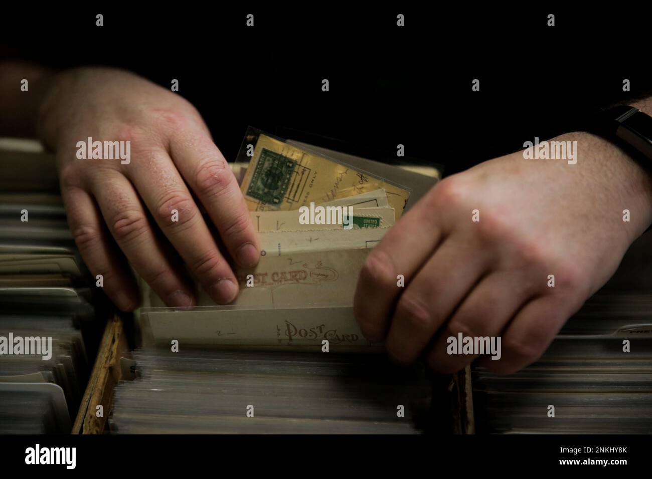 Robert Holt looks through vintage postcards at the Vintage Paper Fair ...