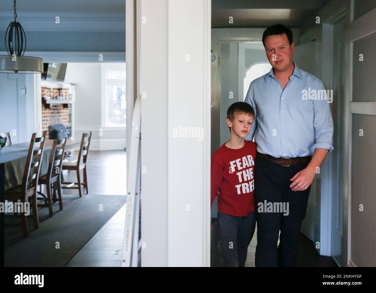 San Francisco Giants broadcaster Dave Flemming walks with his son ...