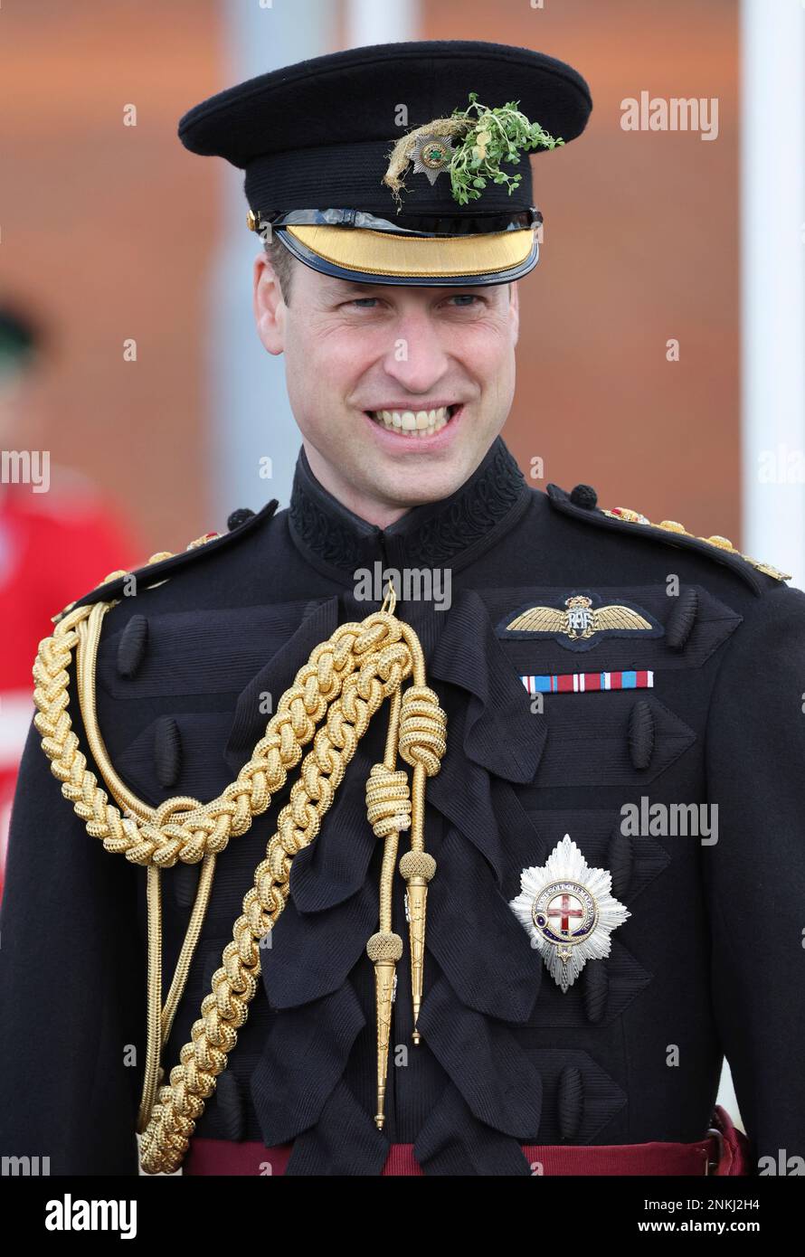 Britain's Prince William smiles as he attends the 1st Battalion Irish ...