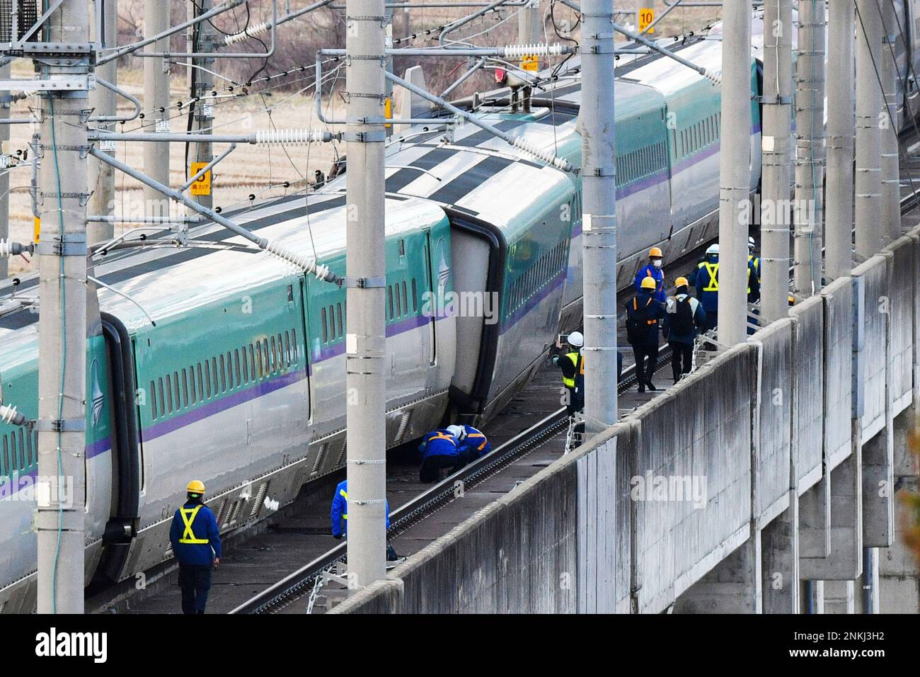 A photo shows the shinkansen (bullet train) which was derailed due to ...