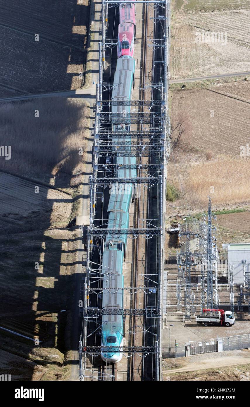 An aerial photo shows the shinkansen bullet train which was derailed ...