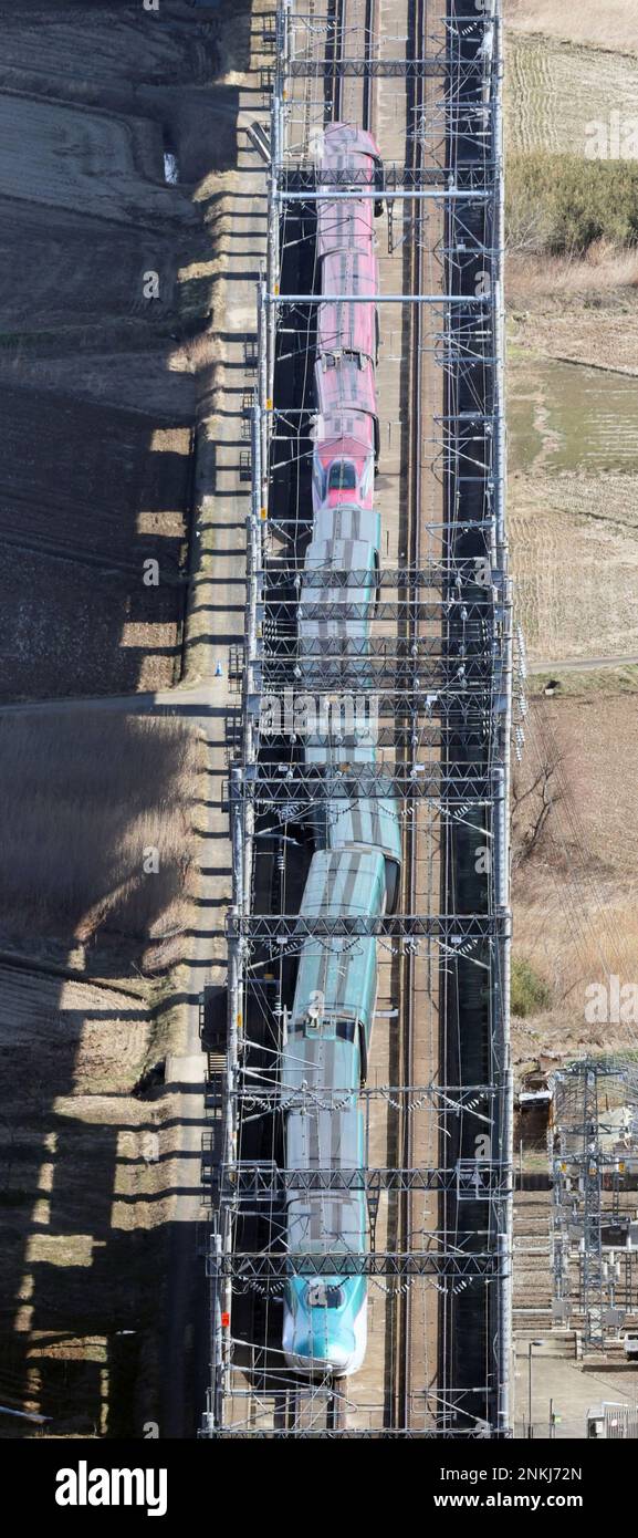 An aerial photo shows the shinkansen bullet train which was derailed ...