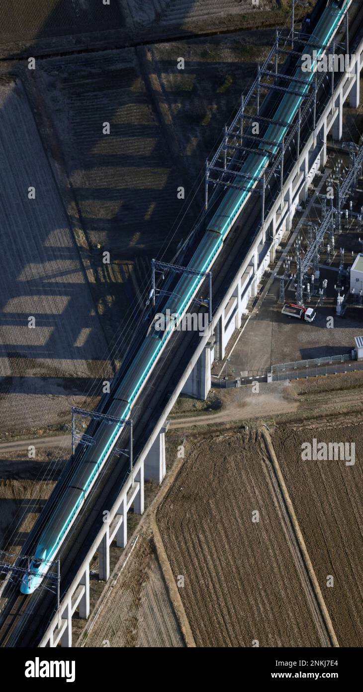 An aerial photo shows the shinkansen bullet train which was derailed ...