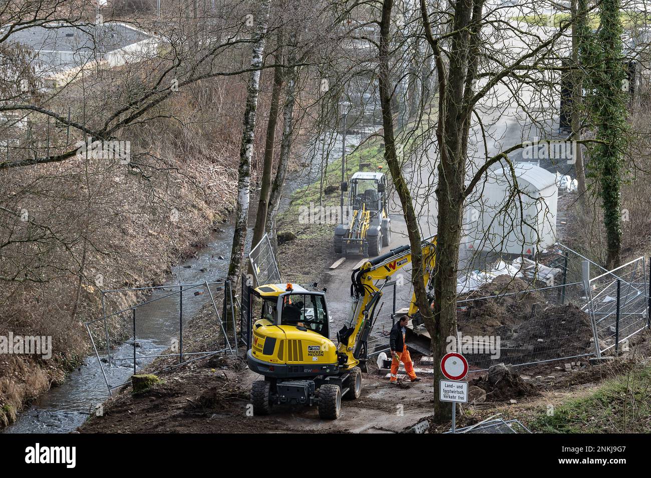 Bad Gandersheim, Germany. 22nd Feb, 2023. Construction site vehicles ...
