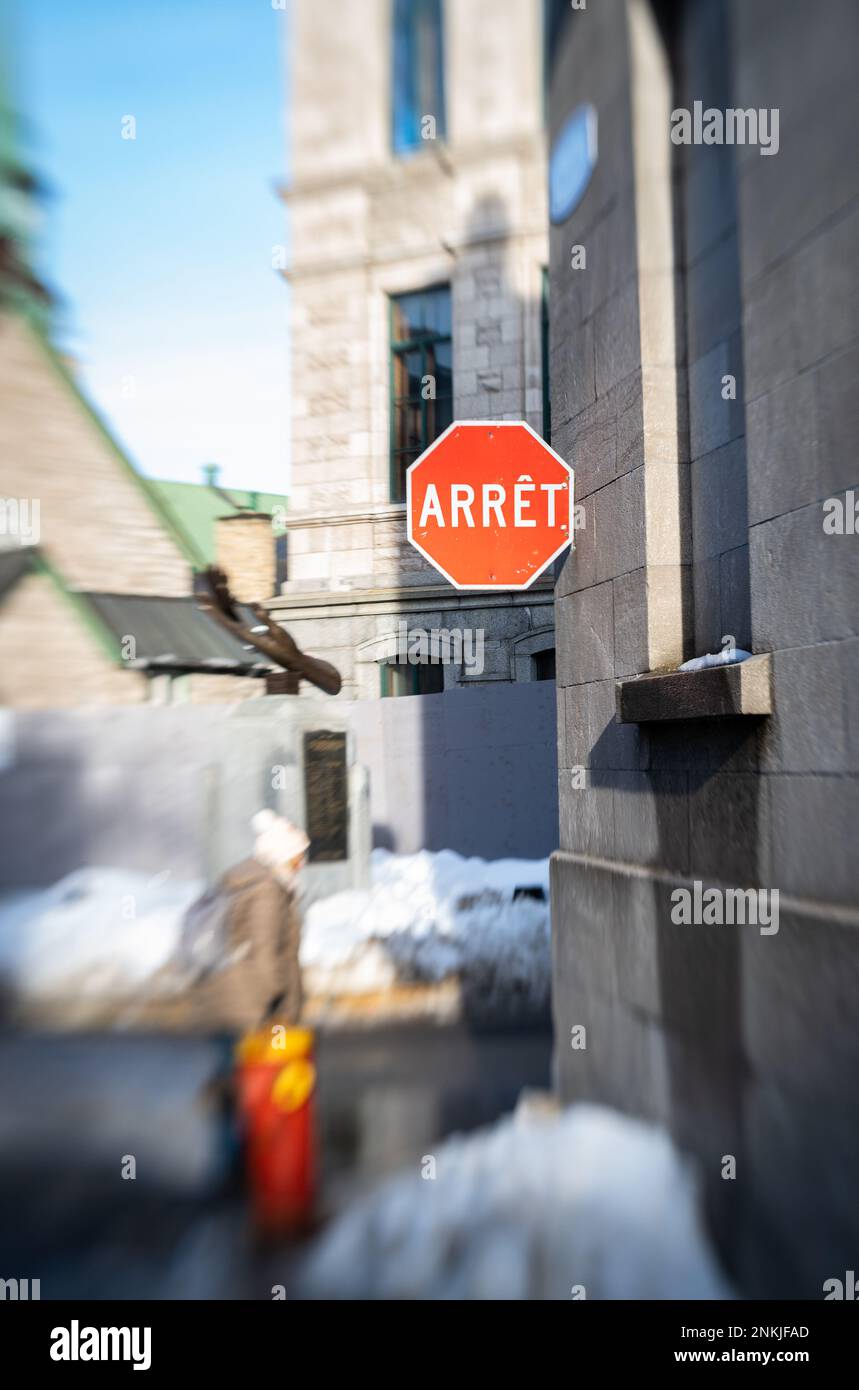 Selective focus winter image of a stop sign in the historic section of ...