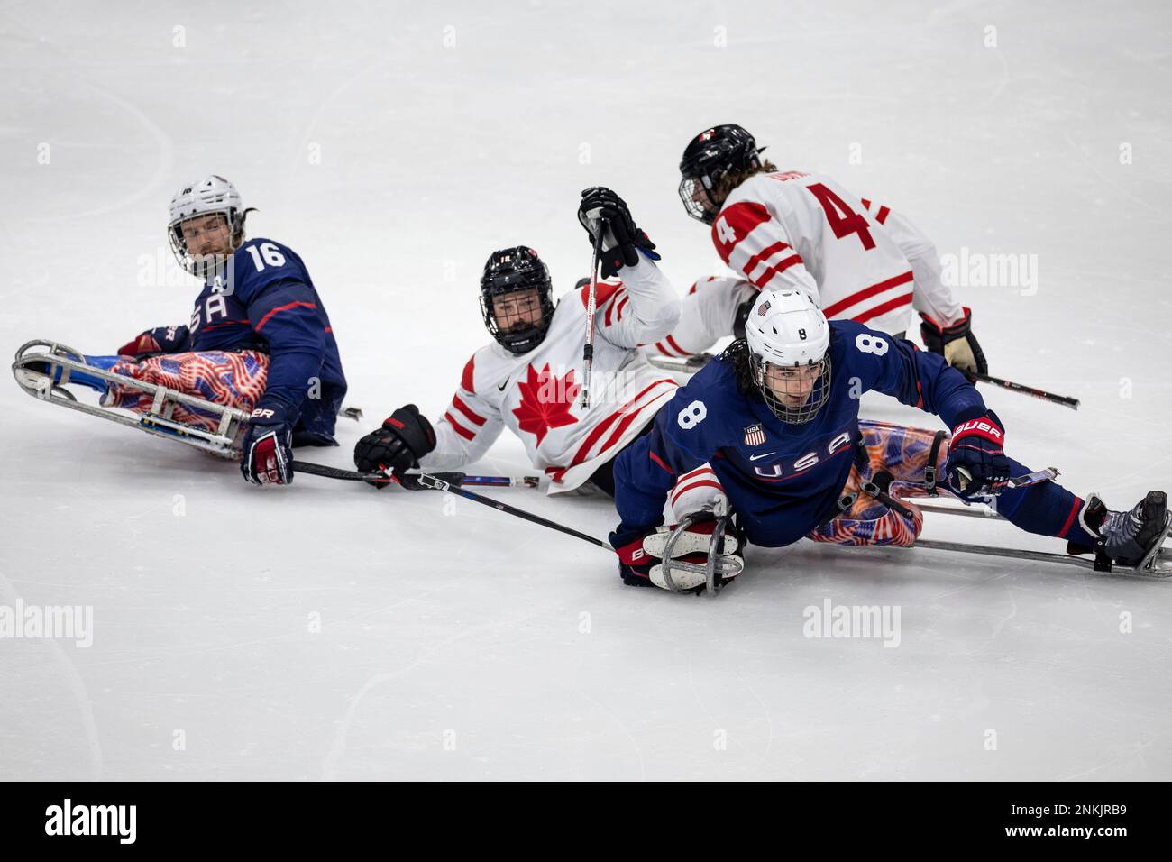The United States' Declan Farmer and Jack Wallace collide with Canada's ...