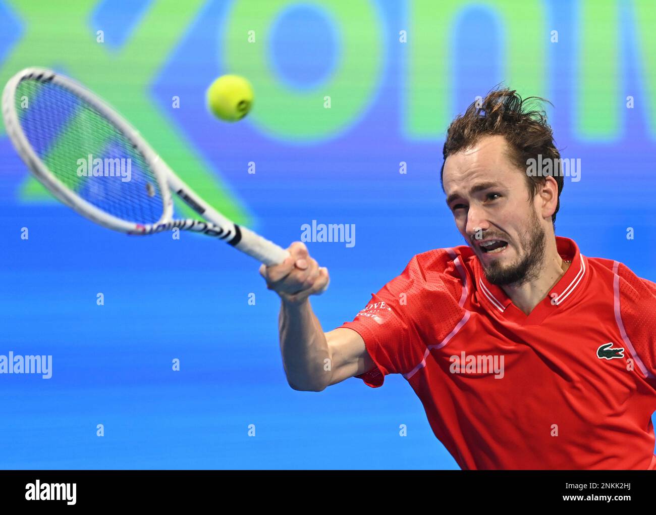 Doha, Qatar. 23rd Feb, 2023. Daniil Medvedev of Russia hits a return ...