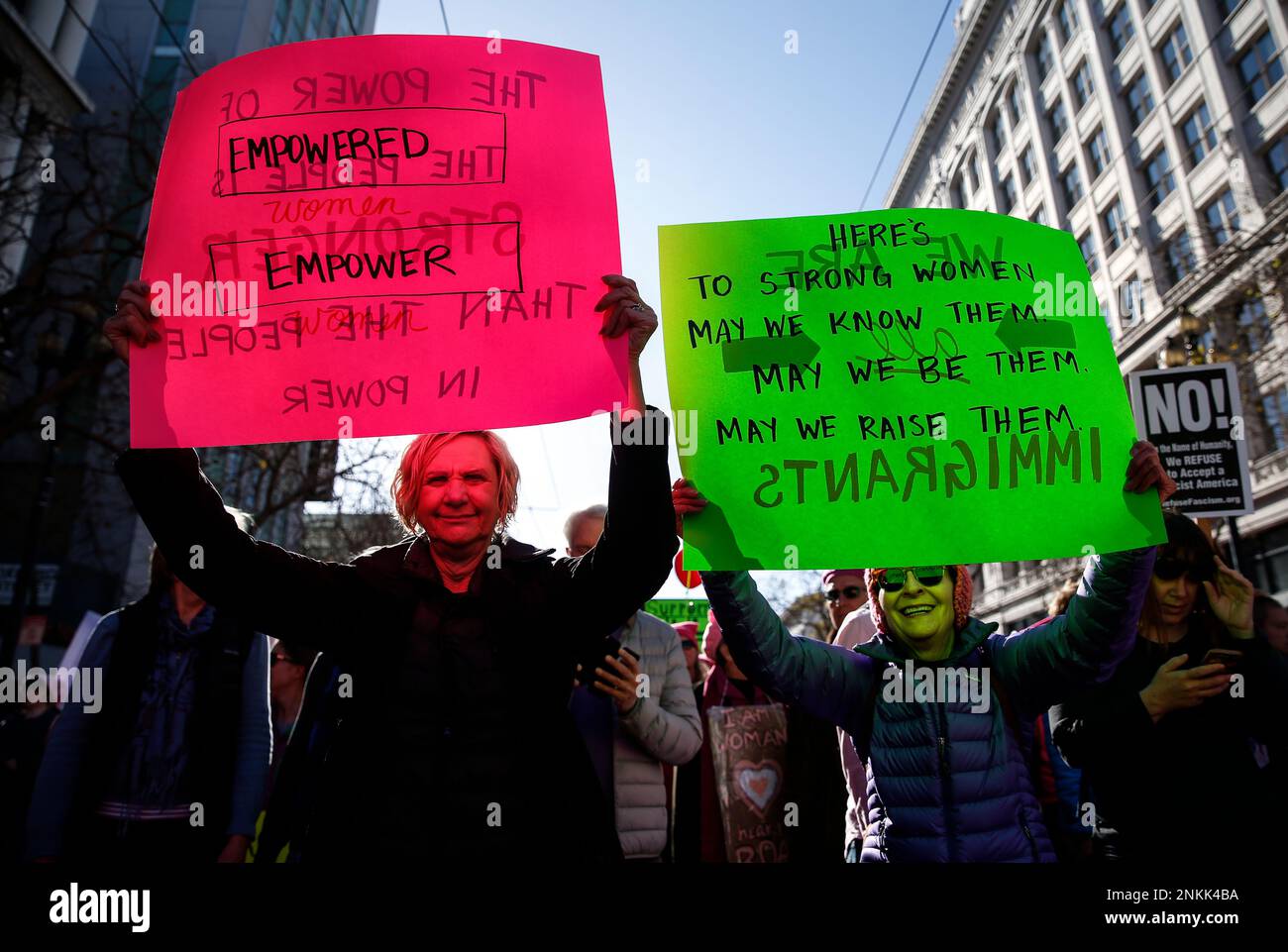Phyllis Harrison, left, of San Mateo and Cyndy Simms of San Mateo carry ...