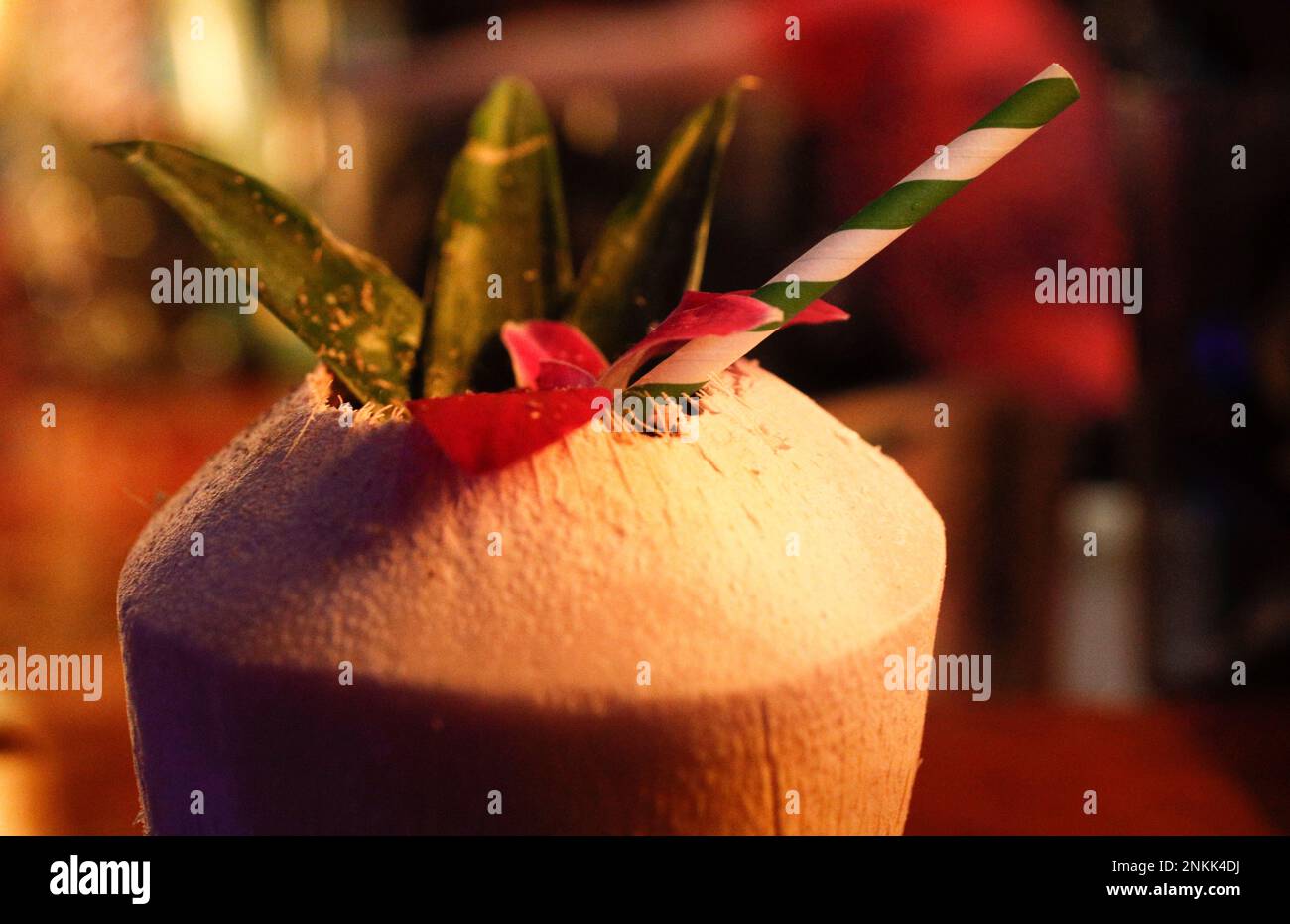 A rum chi chi with paper straw served at the Pagan Idol where they have ...
