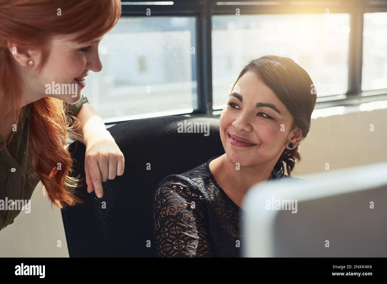 Coming up with genius ideas together. two designers working together on ...