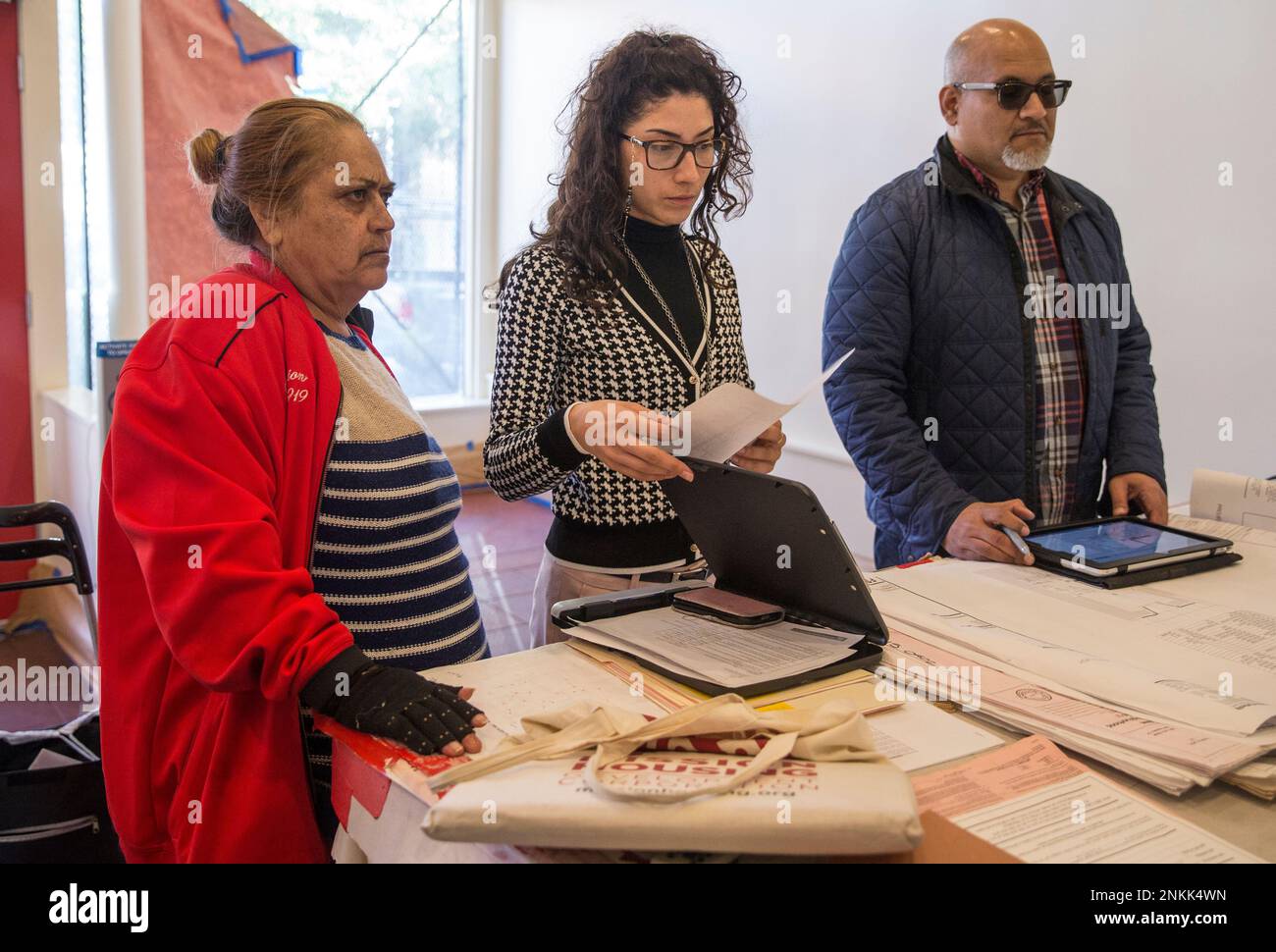 Virginia Ramos, left, also known as the Tamale Lady, stands with Melina ...