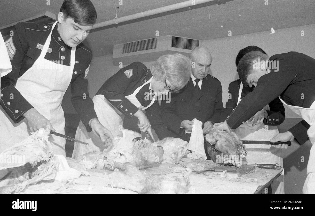Four Marines from the 12th Marine Corp. District help carve turkeys for ...