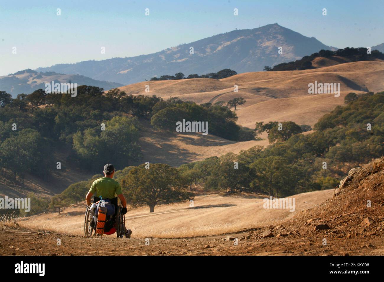 Bob Coomber of Livermore, Calif., heads down Stone Corral Trail in ...