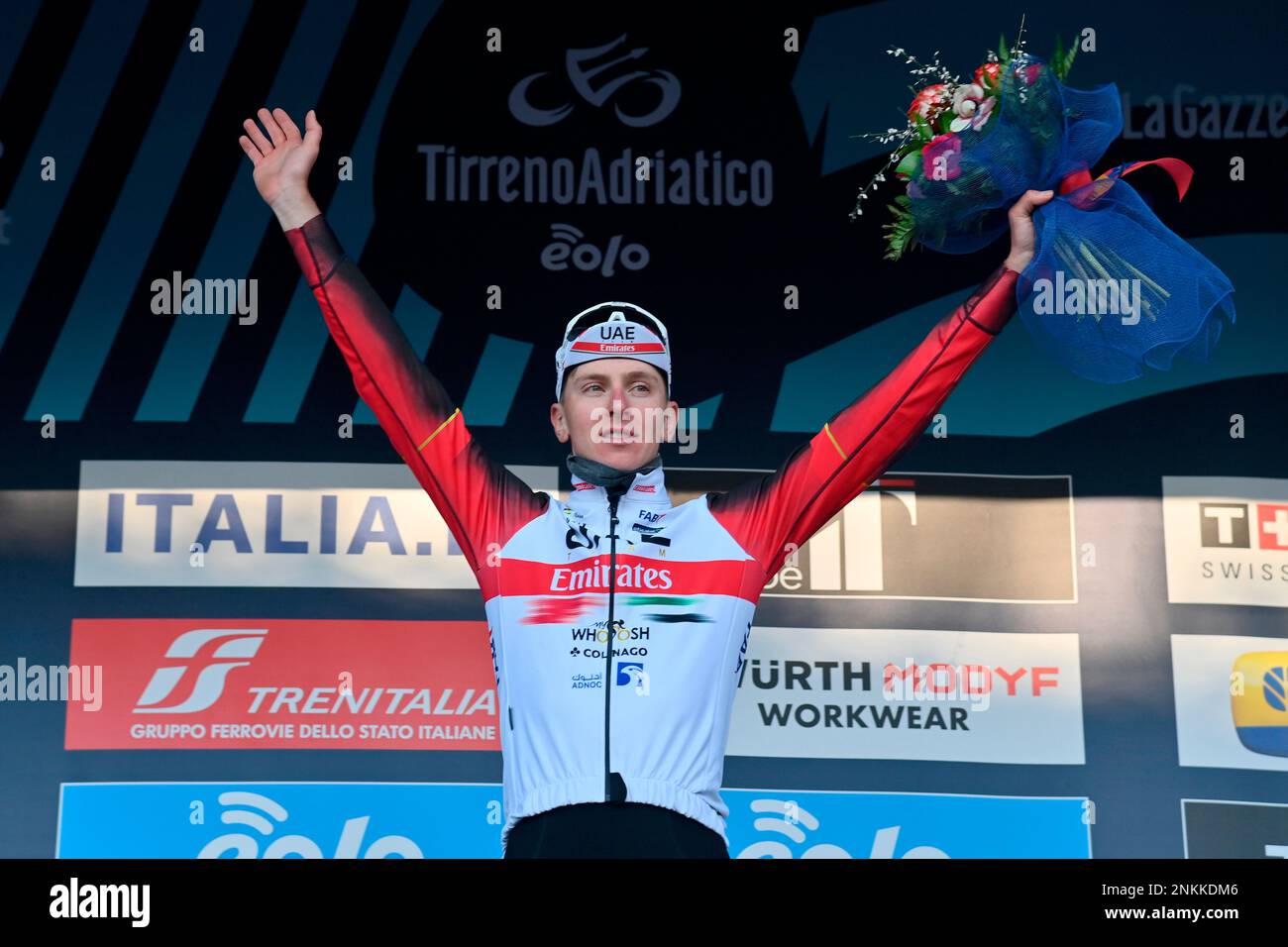 Slovenia's Tadej Pogacar celebrates on the podium after winning the ...
