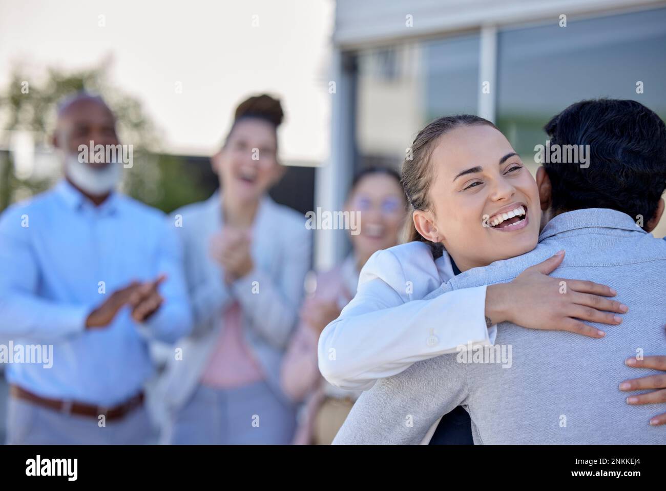 Team office collaboration embracing hi-res stock photography and images ...