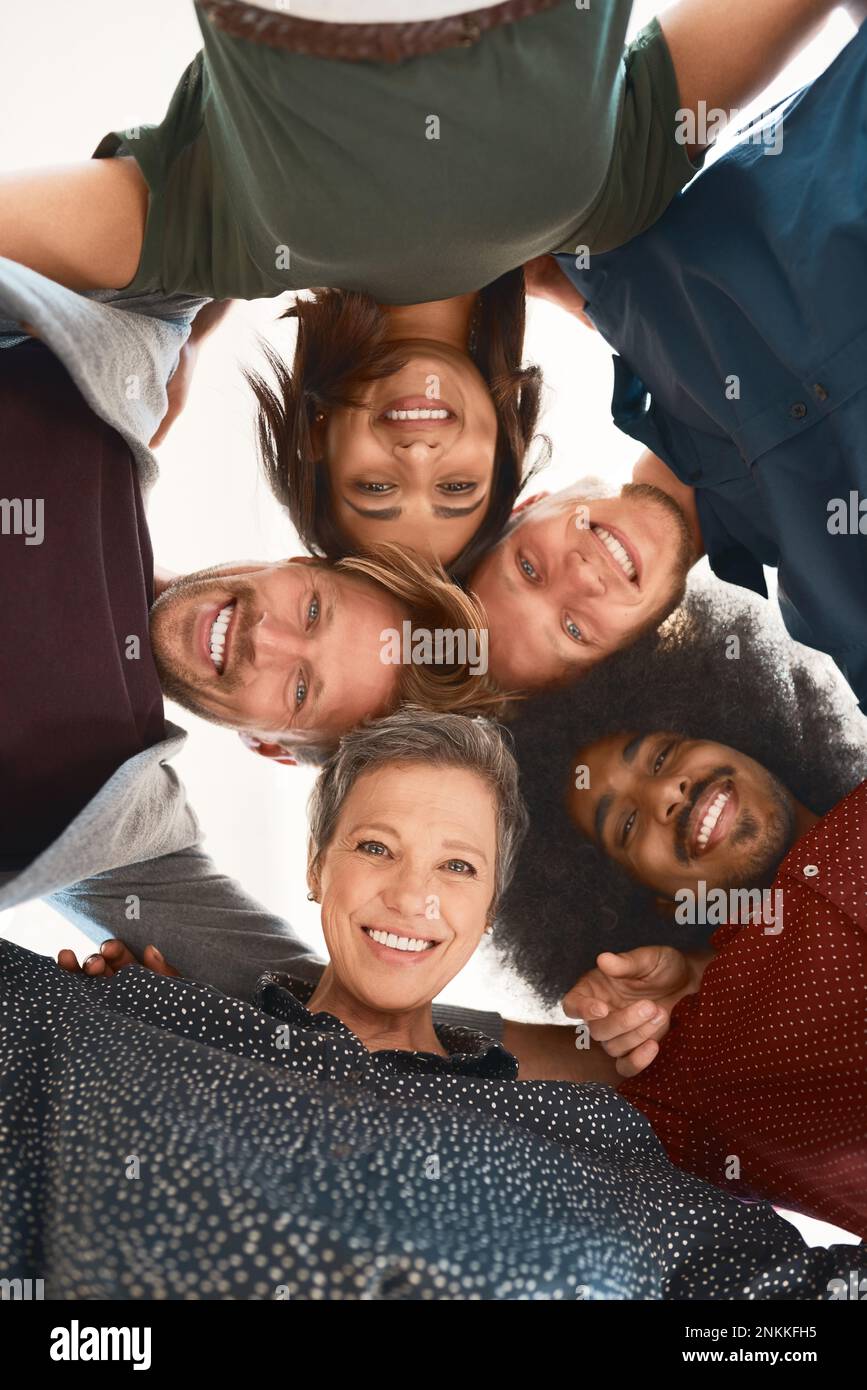 Great things happen when we combine ideas. Low-angle portrait of a team ...