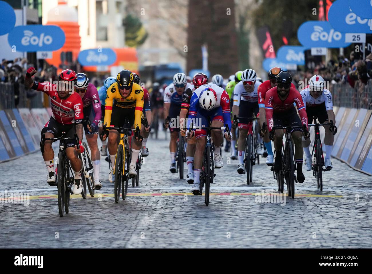 Australia's Caleb Ewan, left, wins the third stage of the Tirreno ...