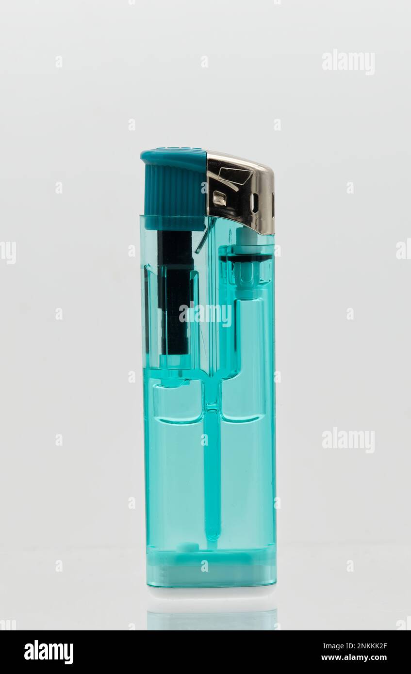 Transparent turquoise lighter isolated on white background Stock Photo ...
