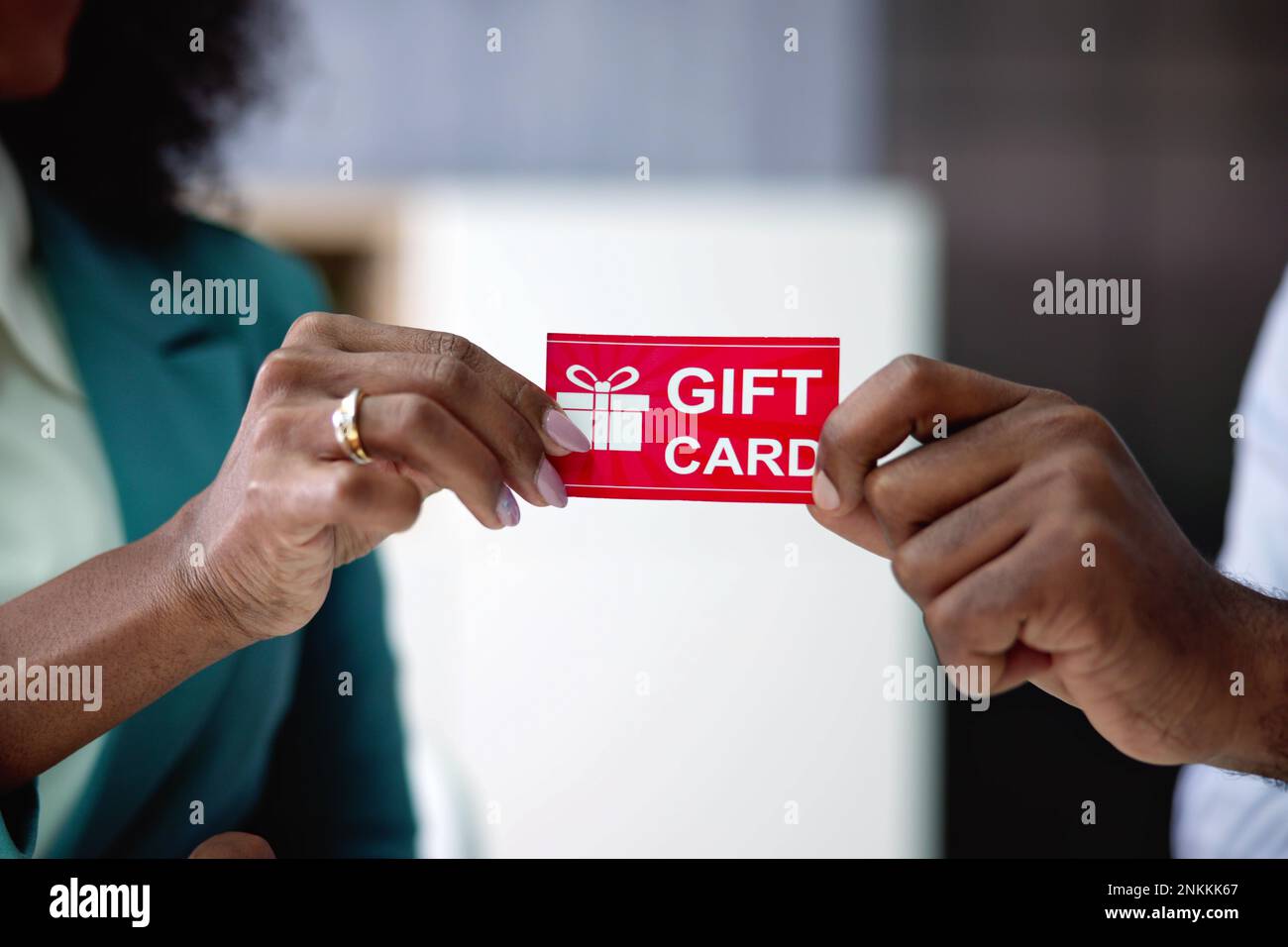Holding Giving Gift Card Voucher And Ticket Stock Photo - Alamy