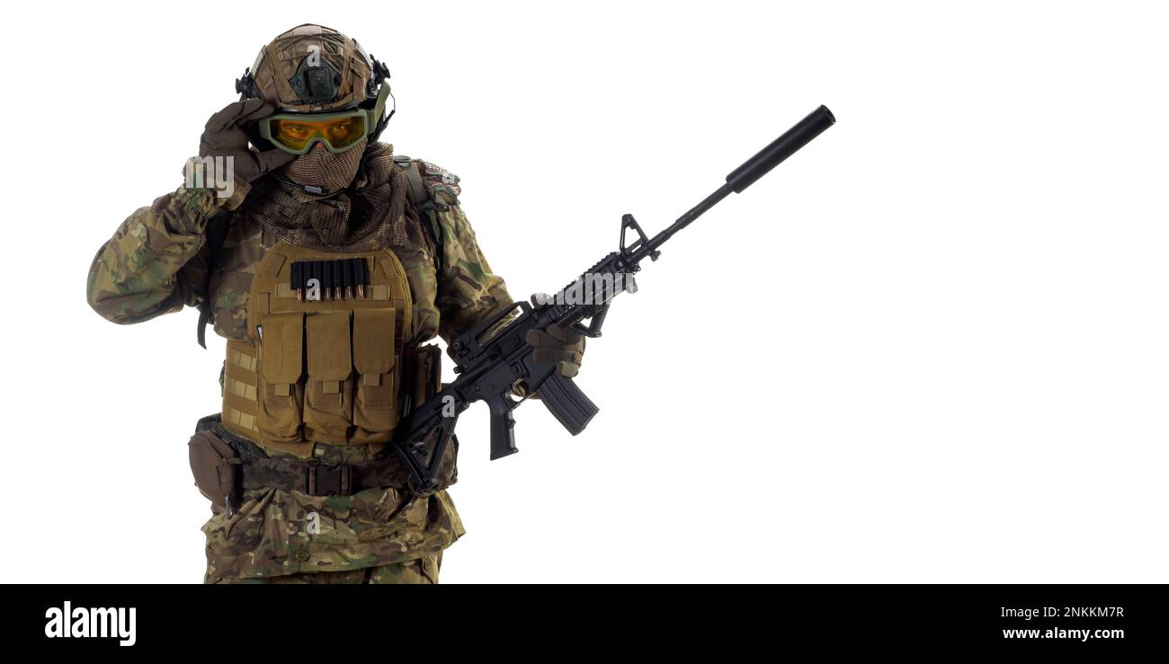 A professional mercenary soldier during a special operation. He calls ...