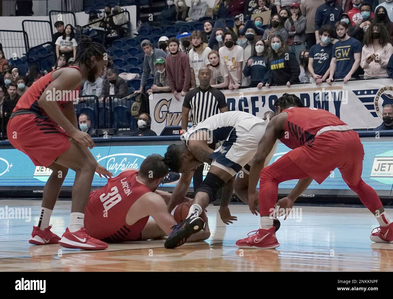 WASHINGTON, DC - MARCH 02: Duquesne Dukes guard Davis Larson (30) and ...
