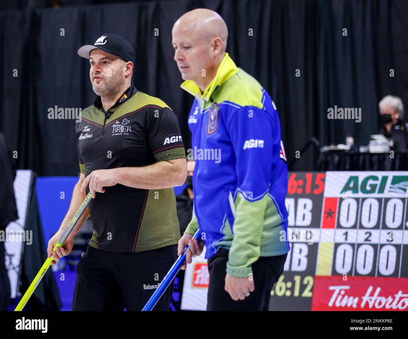 Team New Brunswick third Darren Moulding, left, and Team Alberta skip ...