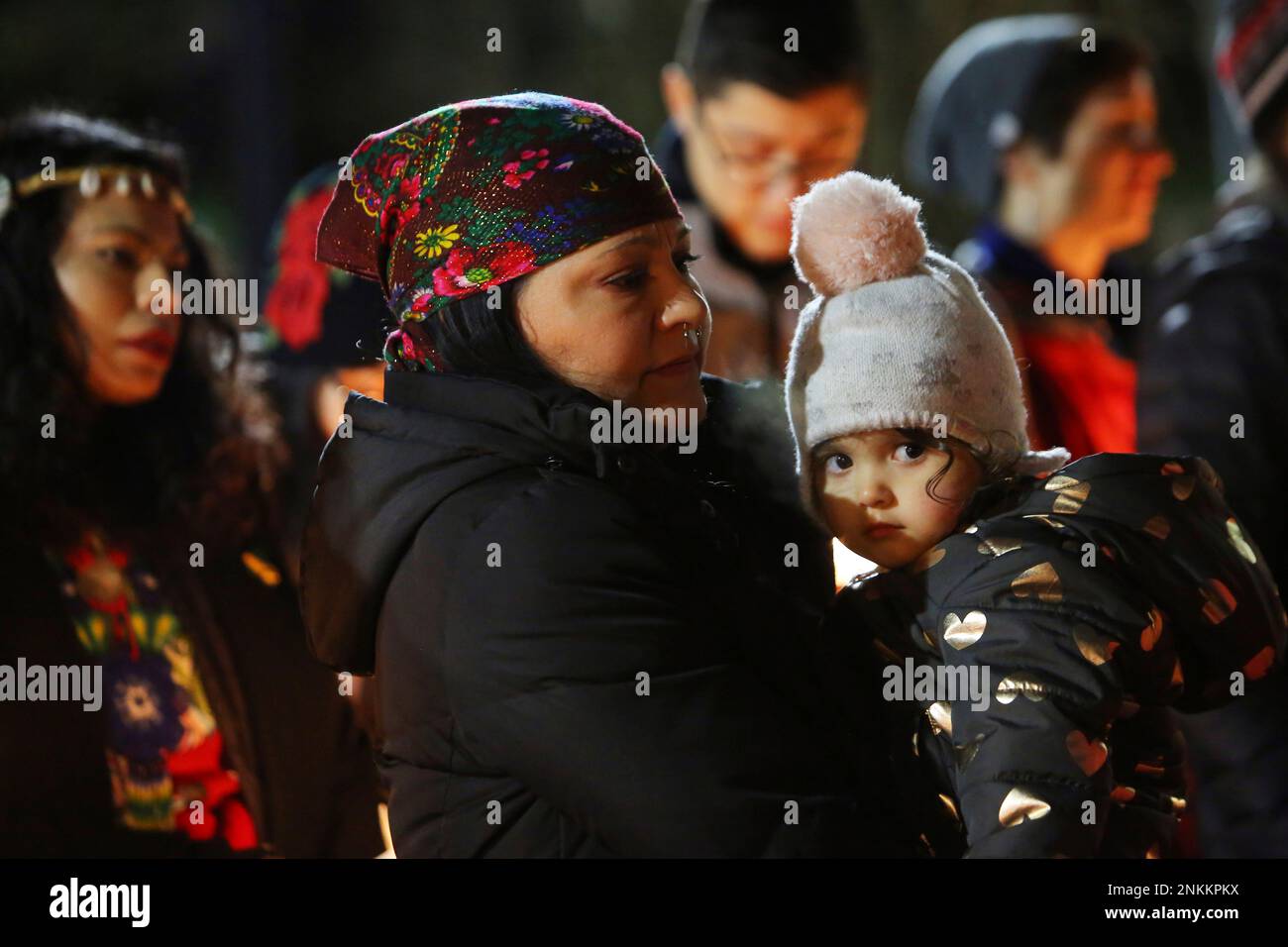 Jennifer Fuentes, of Indigenous Sisters Resistance, holds her neice ...