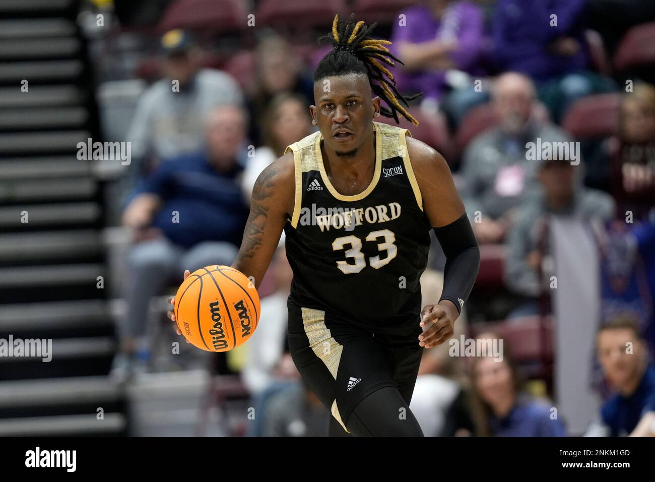 Wofford forward B.J. Mack (33) brings the ball down court during an ...