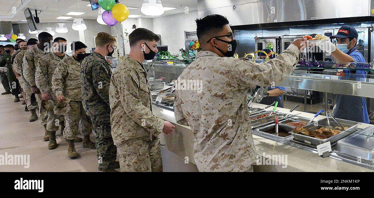 Marines line up in one of the serving lines inside the new chow hall at ...