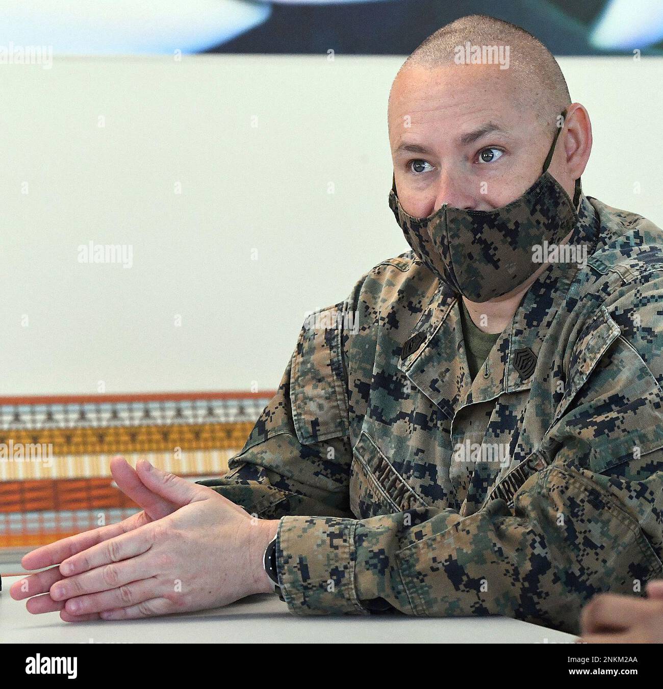 U.S. Marine Corps Master Sgt. Michael Meeks, a food technician, speaks ...