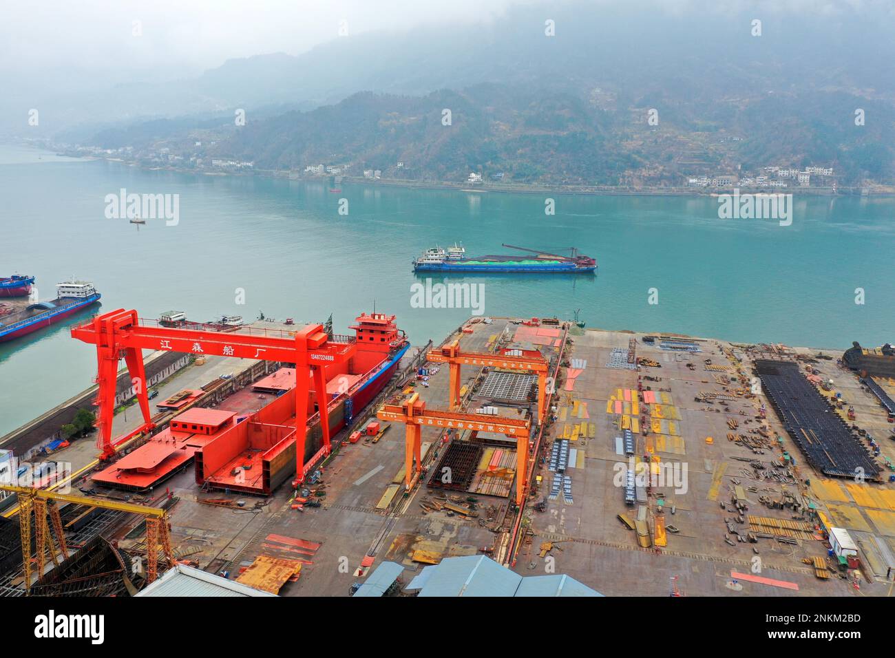 Aerial photo shows workers are busy working at a shipbuilding base in ...