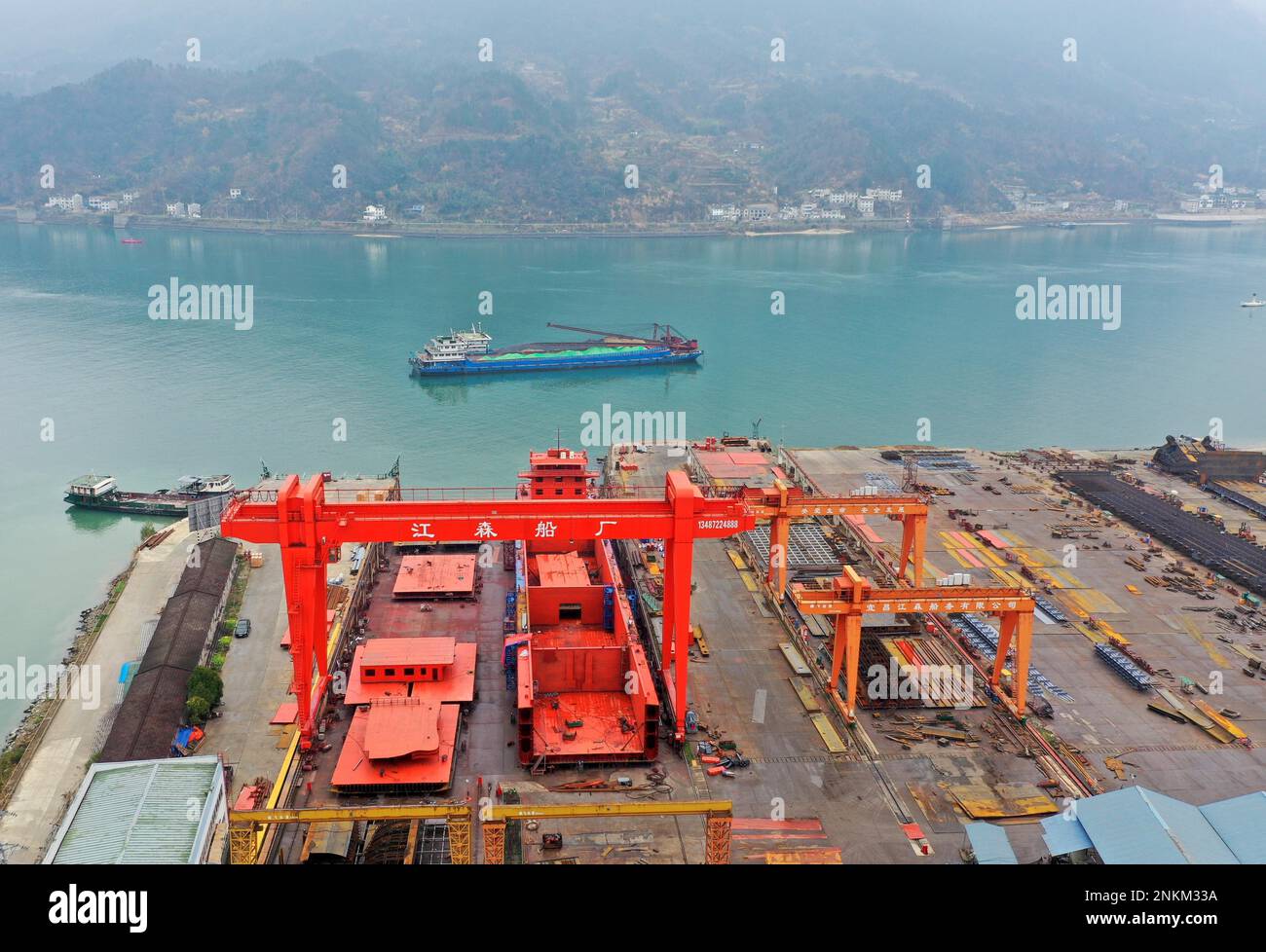 Aerial photo shows workers are busy working at a shipbuilding base in ...
